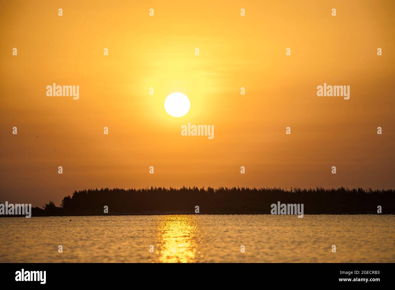 Morning sunrise over a lake - photograph Stock Photo - Alamy