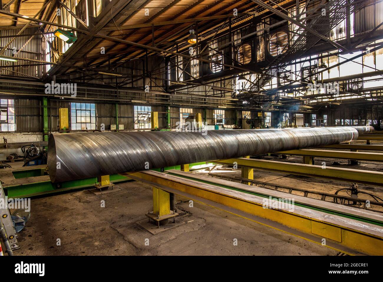 Pipe manufacturing plant. Large diameter Metal pipes factory Stock ...