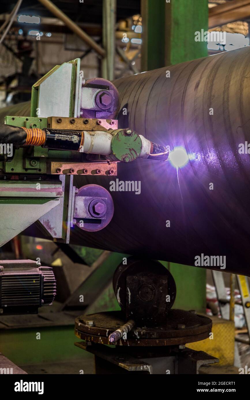 Pipe manufacturing plant. Large diameter Metal pipes factory welding ...