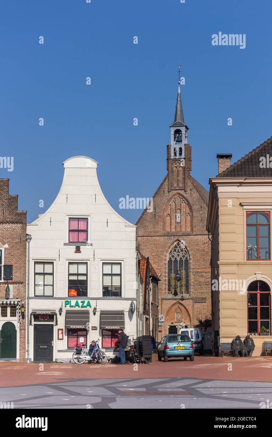 Clock gable and church tower in historic city Steenwijk, Netherlands ...