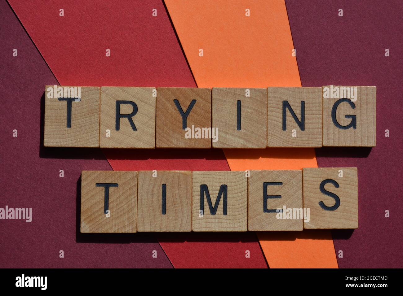 Trying Times, words in wooden alphabet letters isolated on background ...