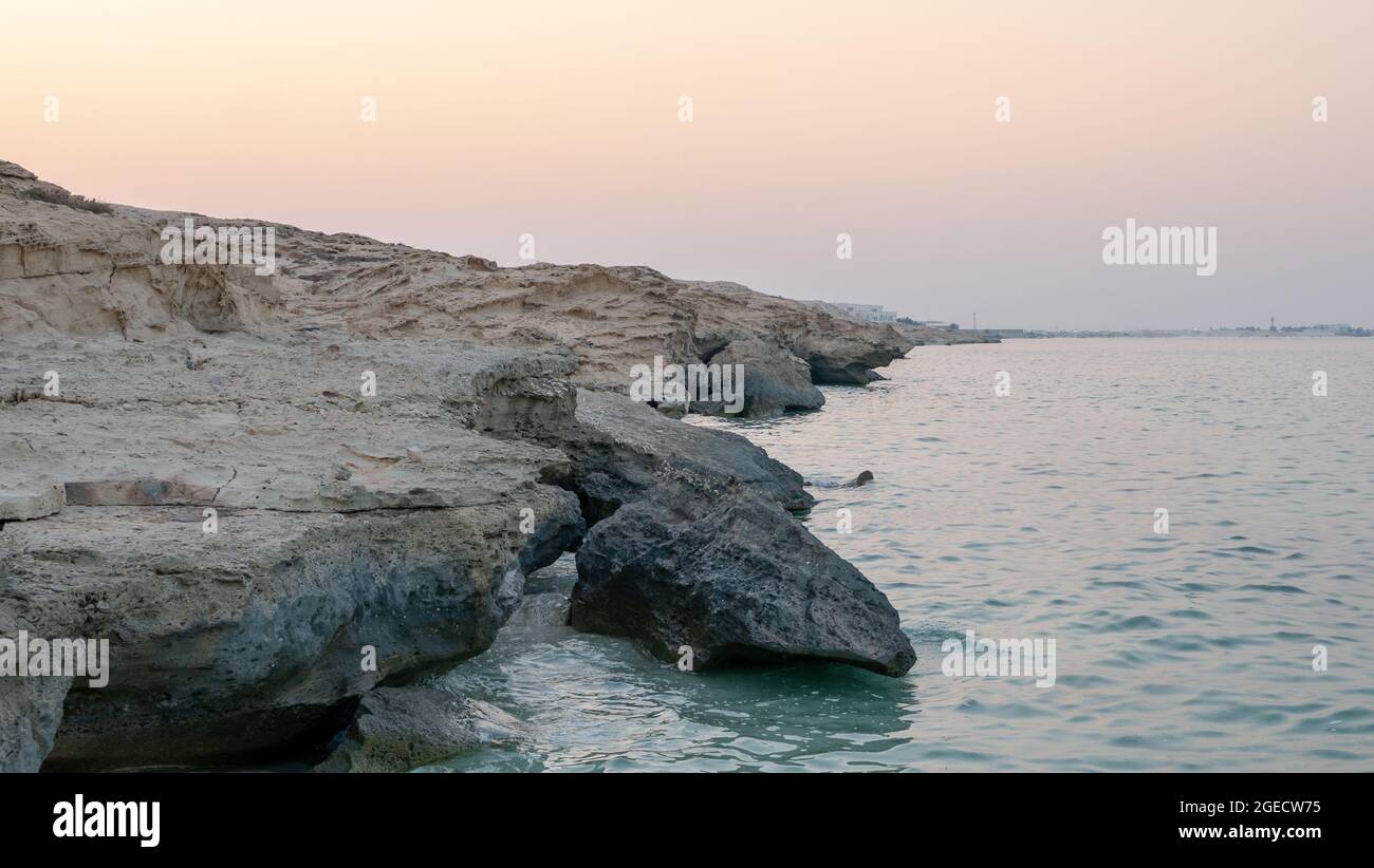jebel fuwairit beach, beautiful beach in qatar with pebbles and rocks ...