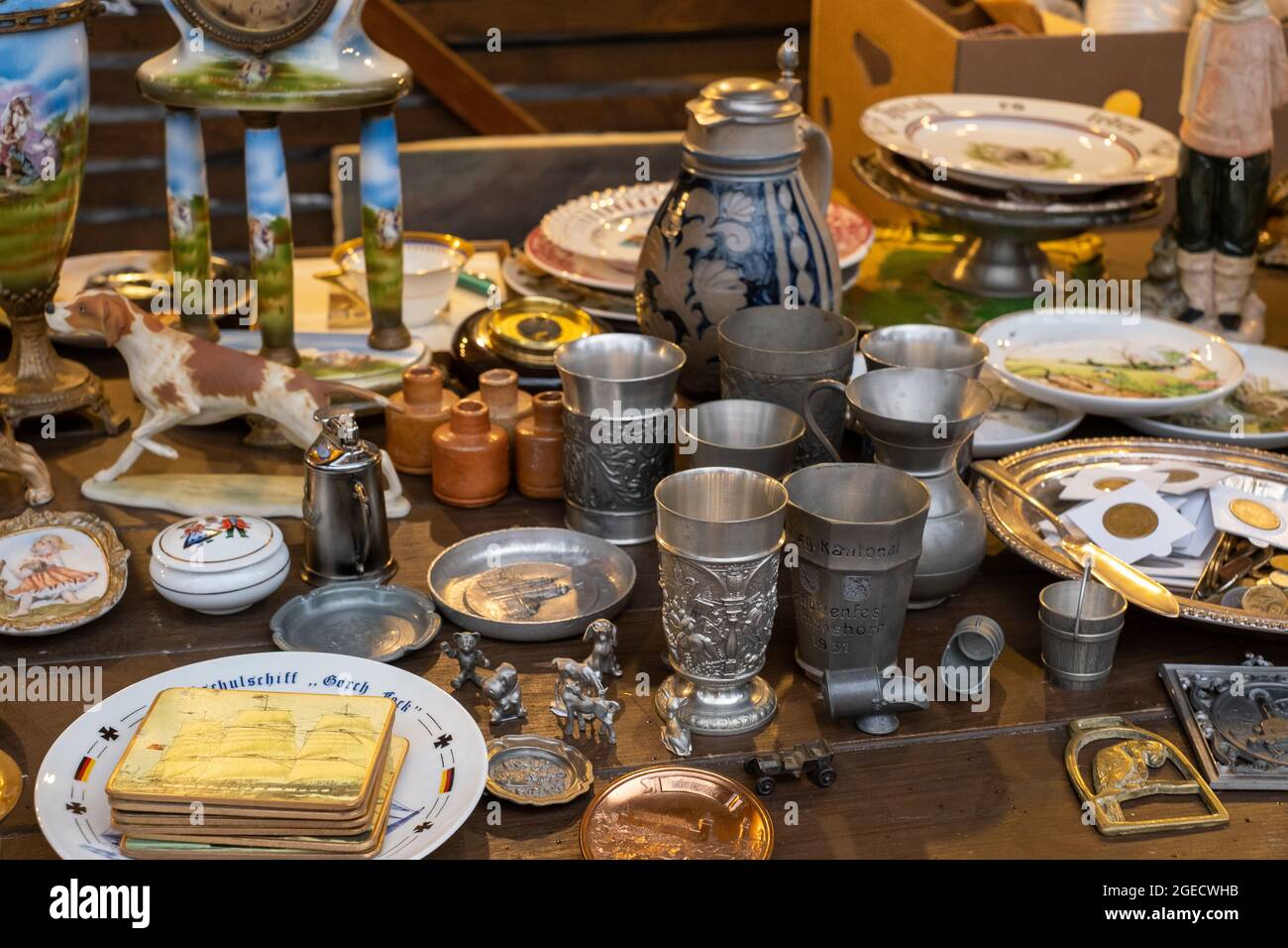 Various tableware on counter at souvenir bazaar Stock Photo - Alamy
