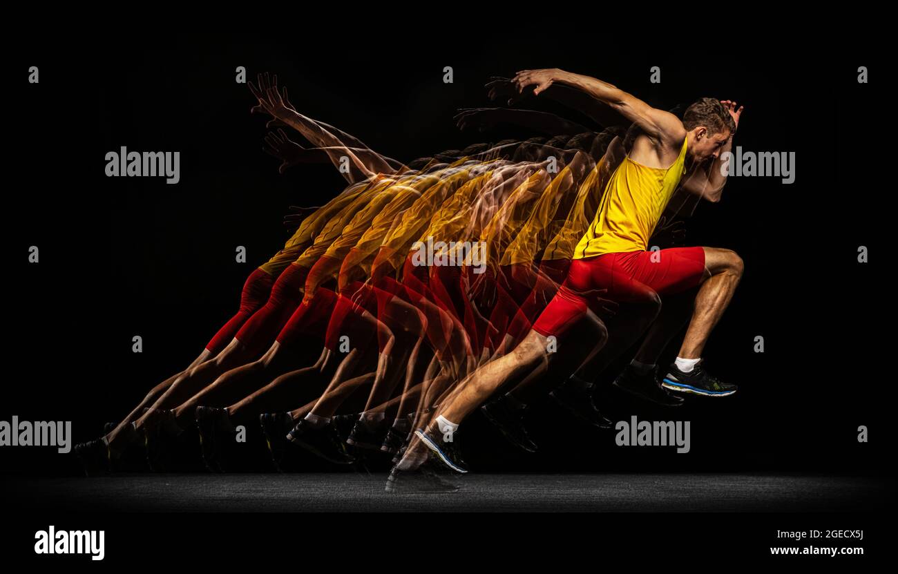 Portrait of young man, professional male athlete, runner in motion and ...