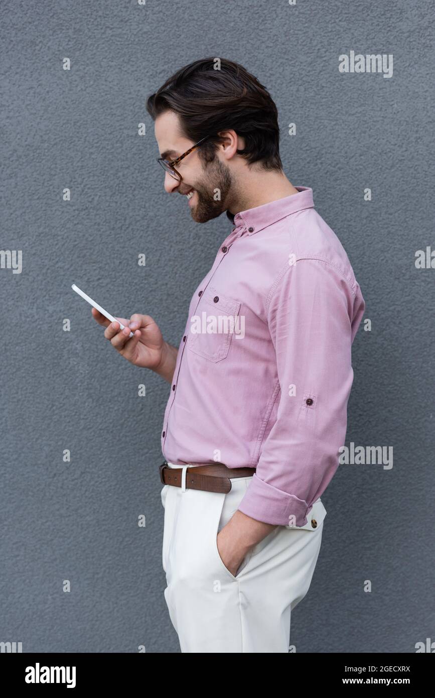 Side view smiling handsome businessman hi-res stock photography and ...