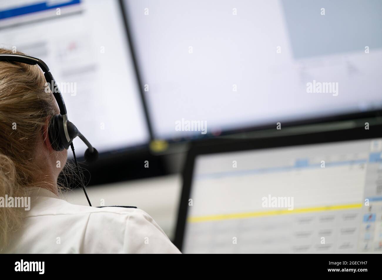 Offenbach, Germany. 19th Aug, 2021. An officer works in the control ...