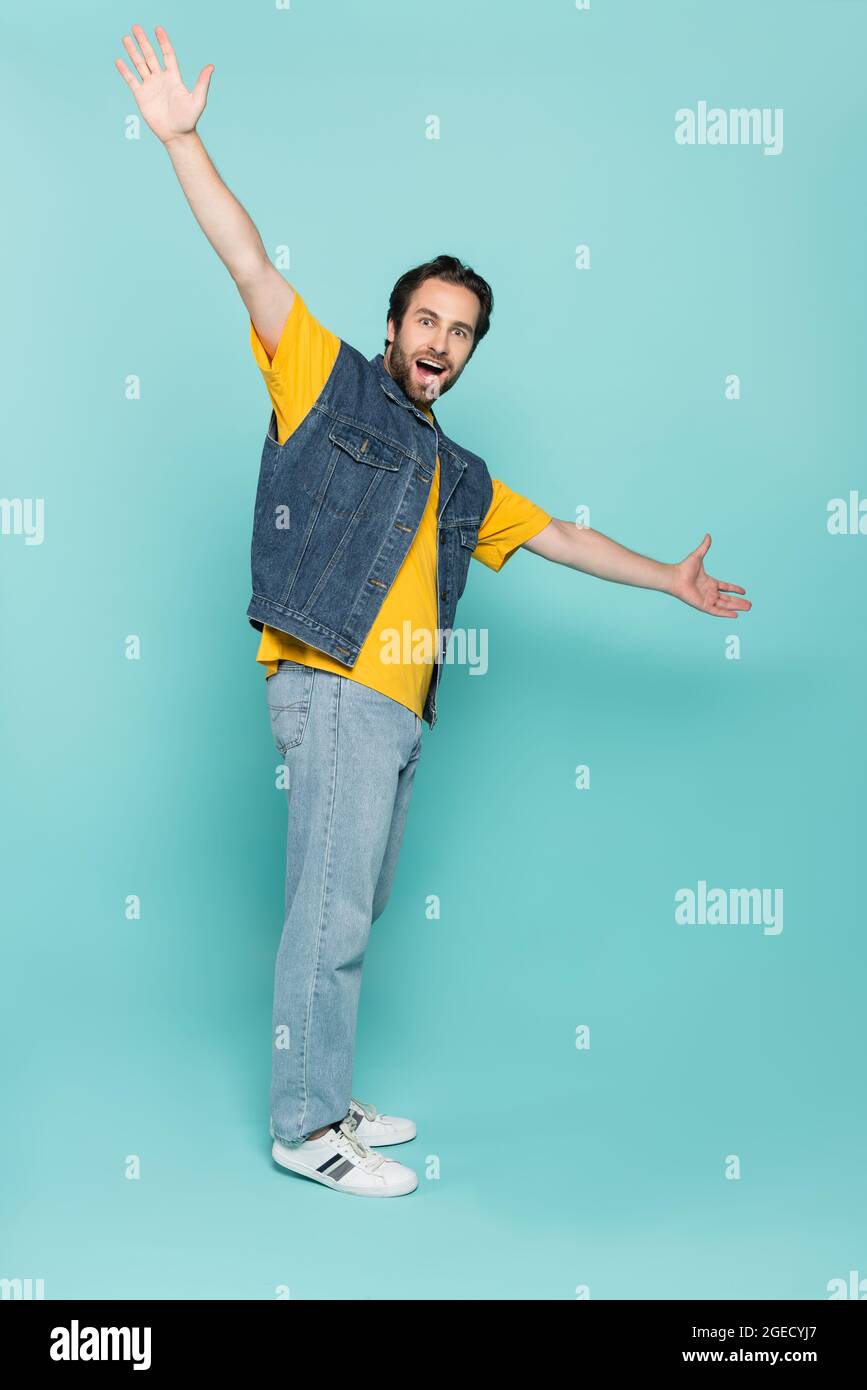 Excited man in blue denim hi-res stock photography and images - Alamy