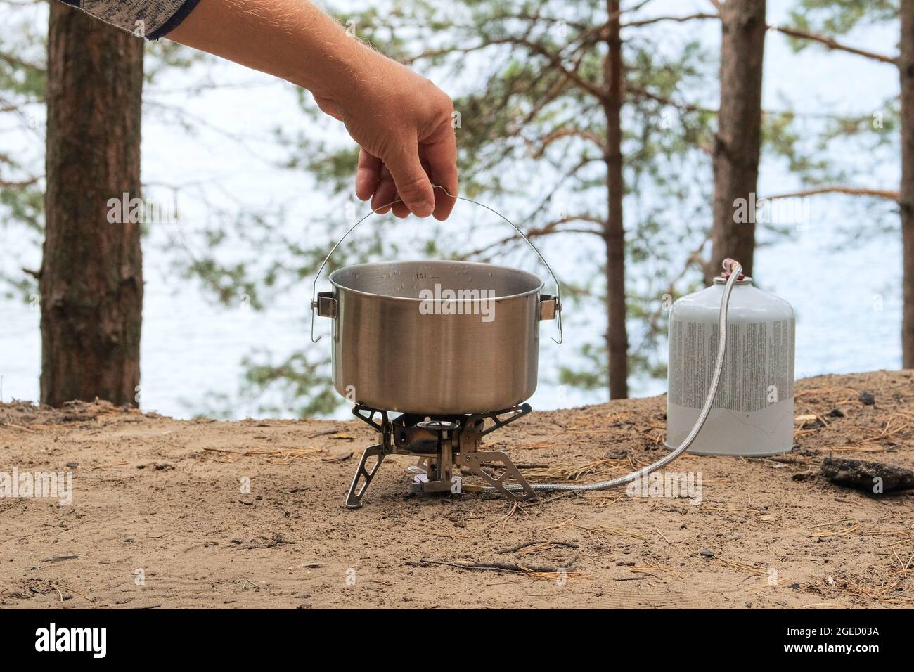 Tourist foods in outdoor activities. Food in bowler in the green forest ...
