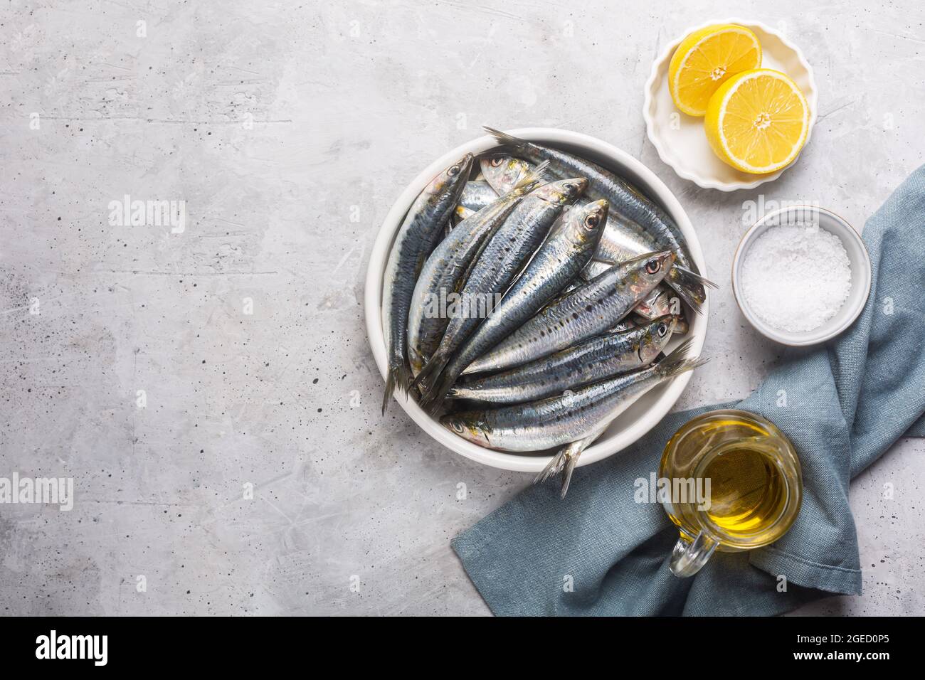 Freshly caught fresh sardines from the Mediterranean sea on the gray ...