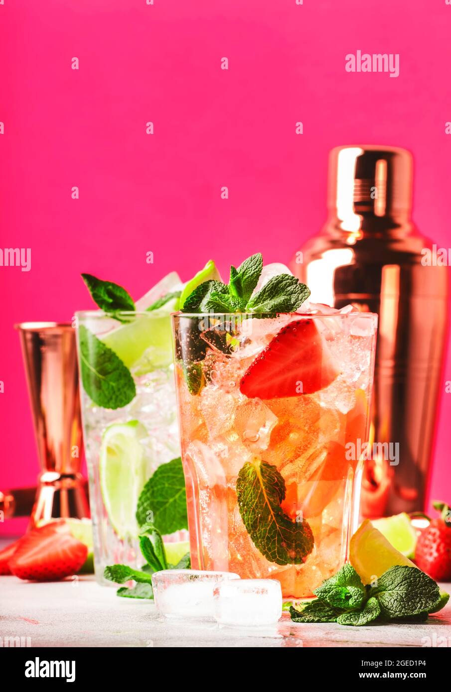 Couple of Mojito cocktails or mocktails with lime, rum, mint ...