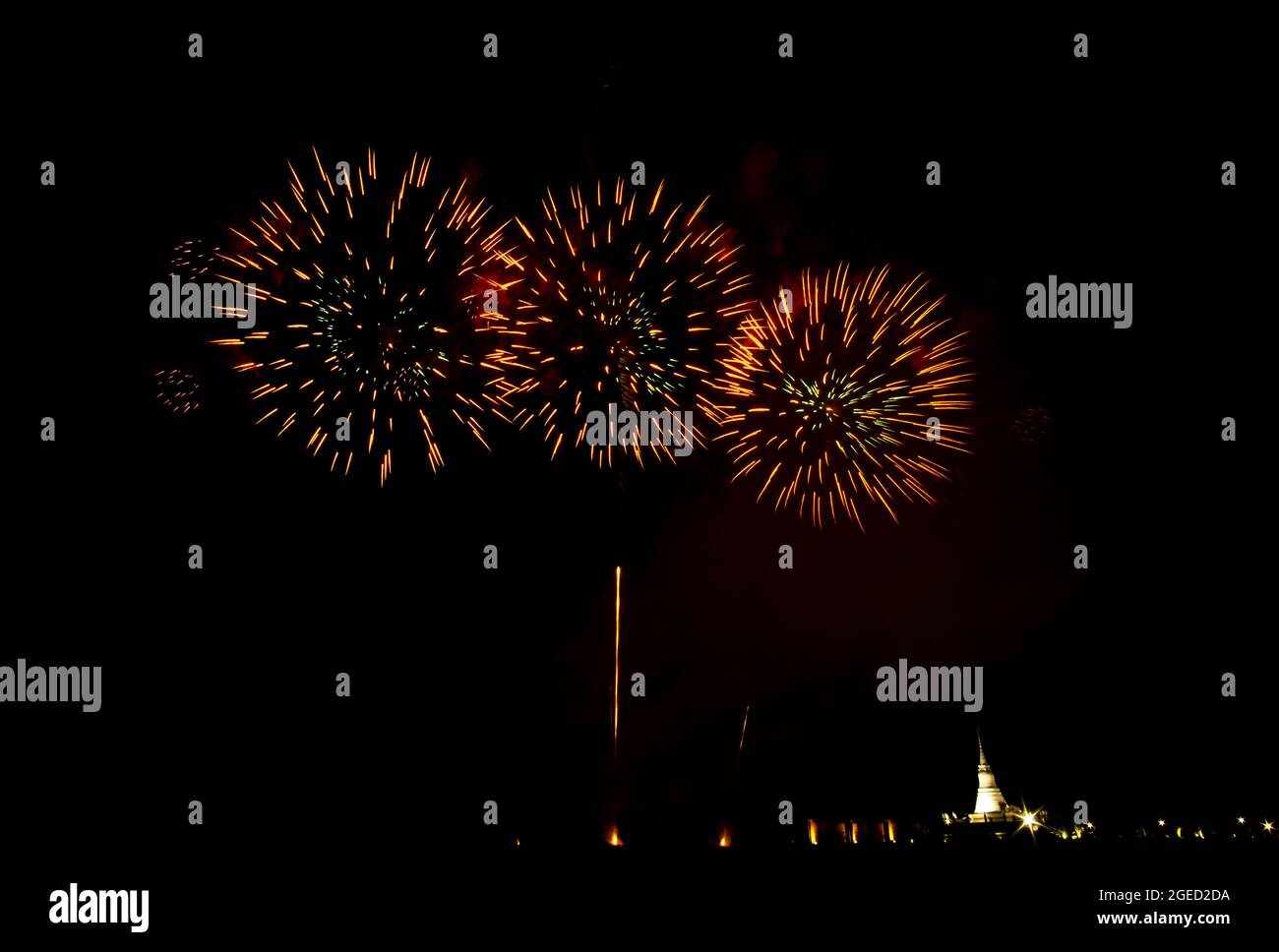 Huge, colorful fireworks over the rice fields at dusk Stock Photo - Alamy