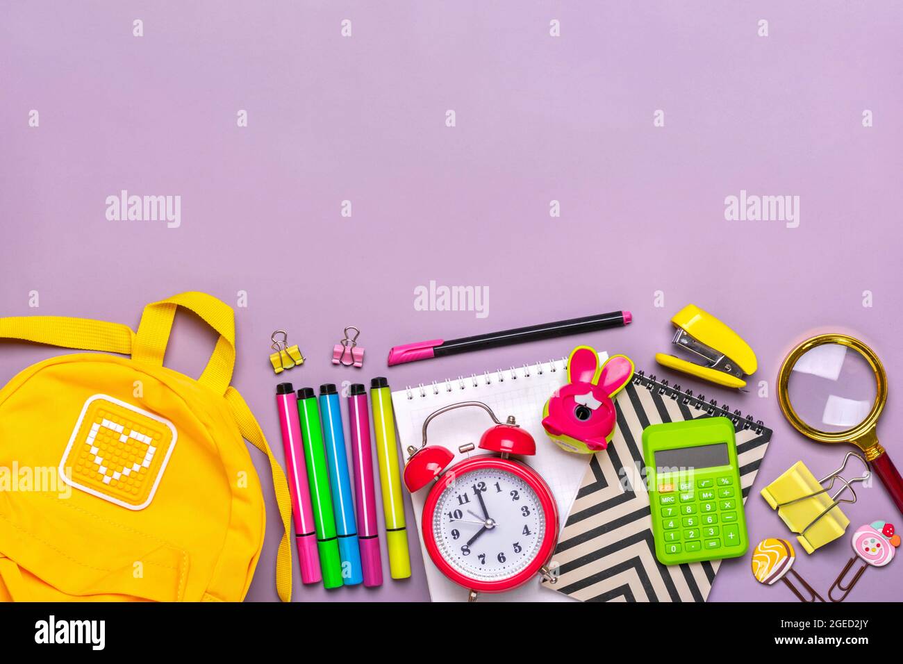 Back to school, education concept. Yellow backpack with school supplies ...