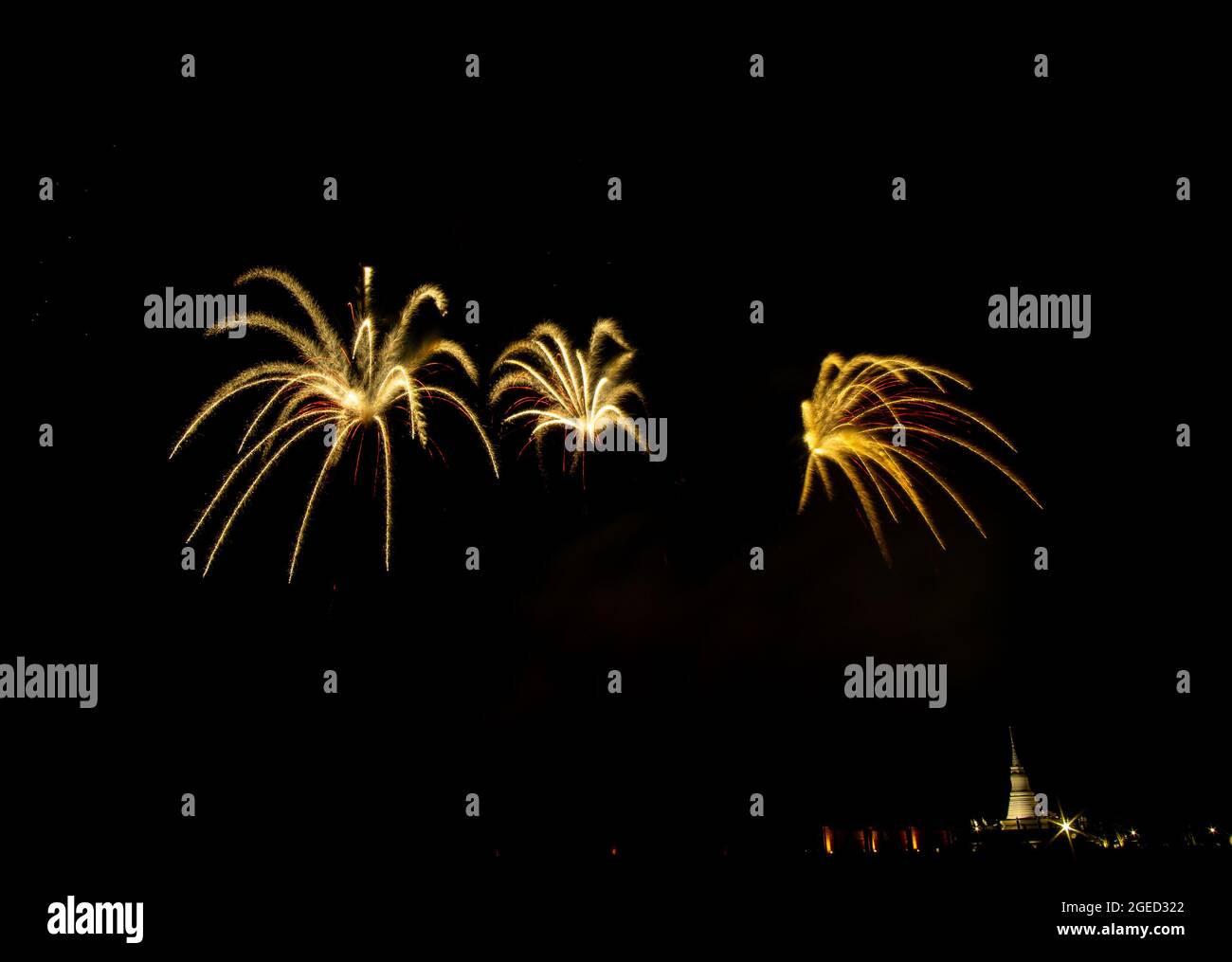 Huge, colorful fireworks over the rice fields at dusk Stock Photo - Alamy