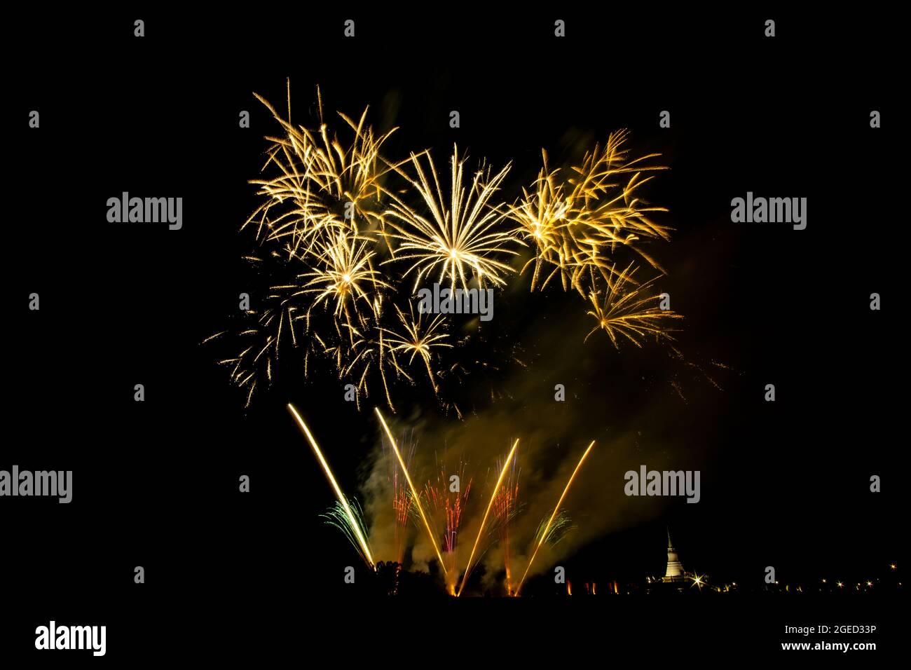 Huge, colorful fireworks over the rice fields at dusk Stock Photo - Alamy