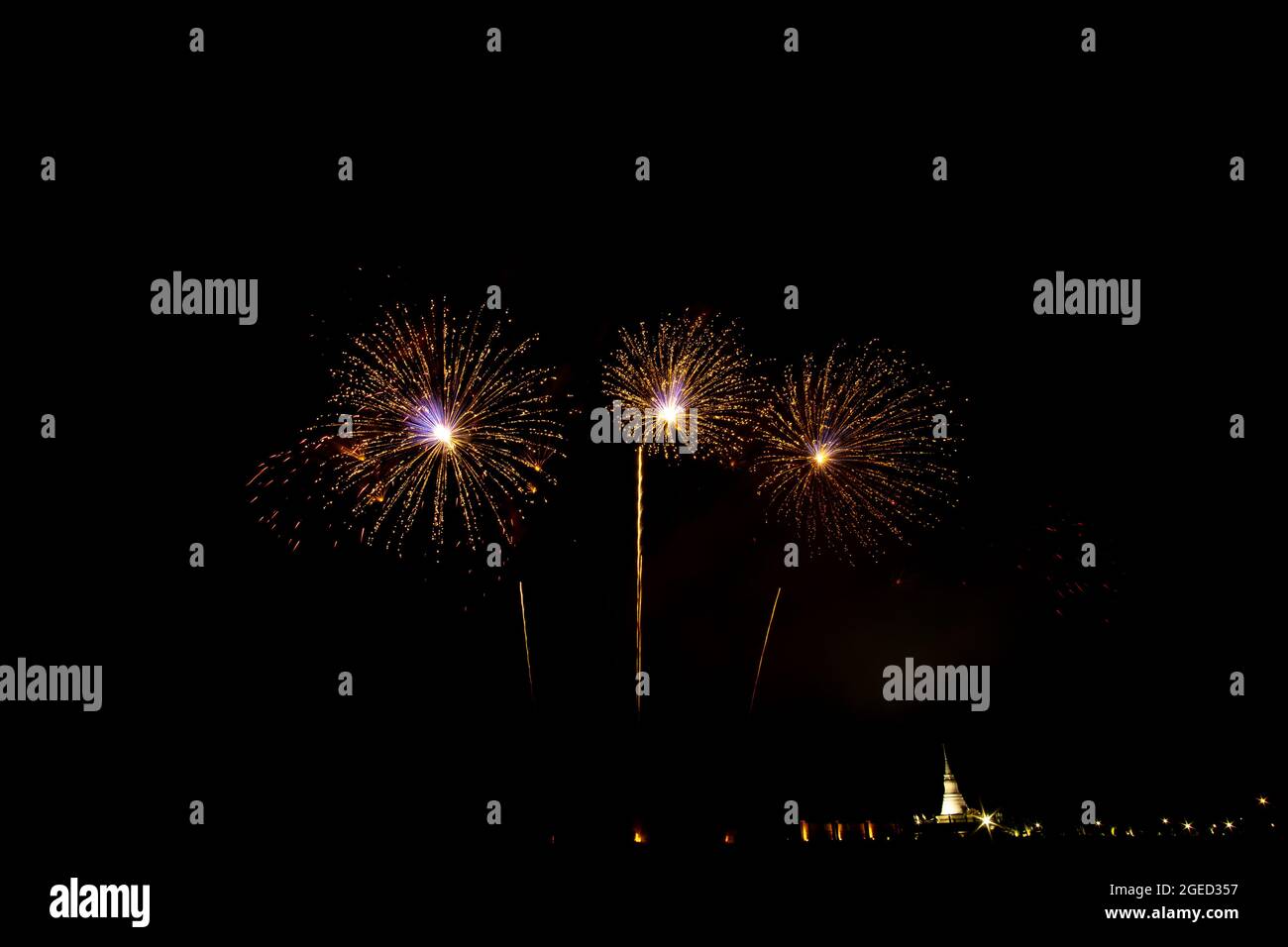 Huge, colorful fireworks over the rice fields at dusk Stock Photo - Alamy