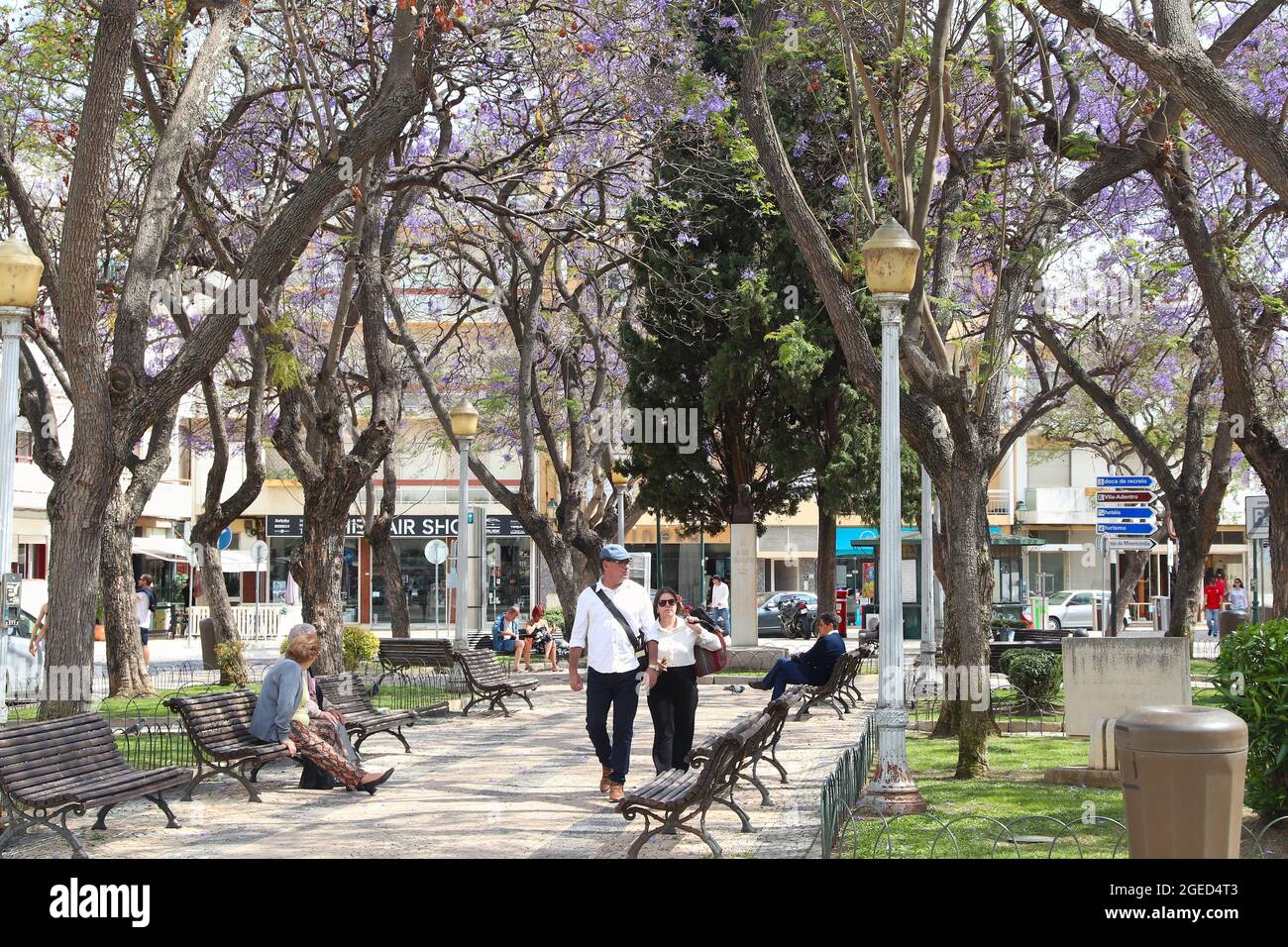 FARO, PORTUGAL - MAY 30, 2018: People visit town park with blooming ...