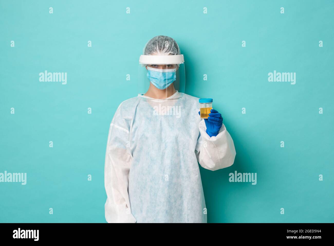 Concept of covid-19, pandemic and health. Serious-looking female doctor ...