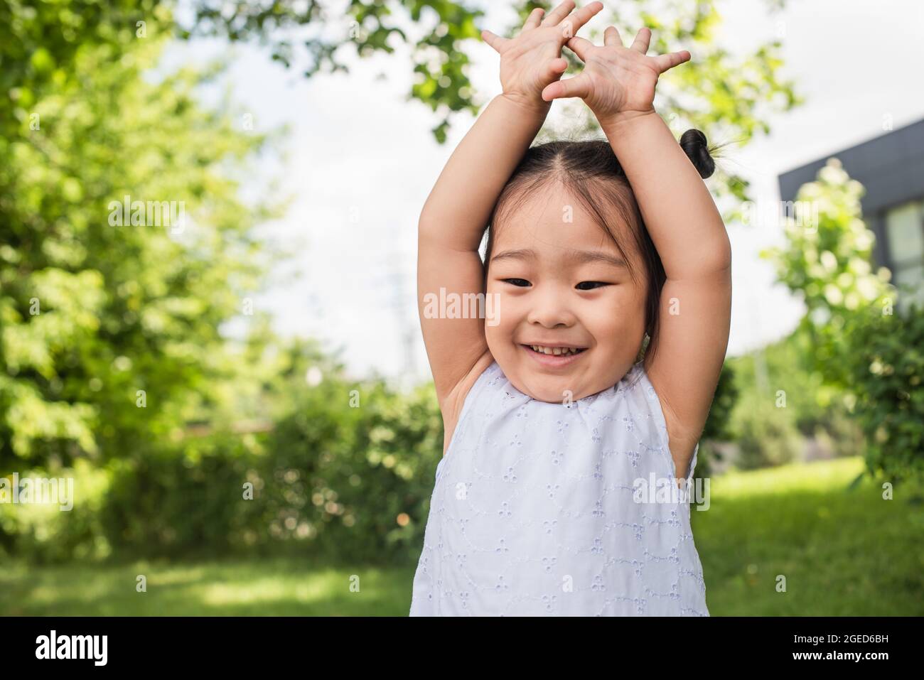 Hands raised above head hi-res stock photography and images - Alamy