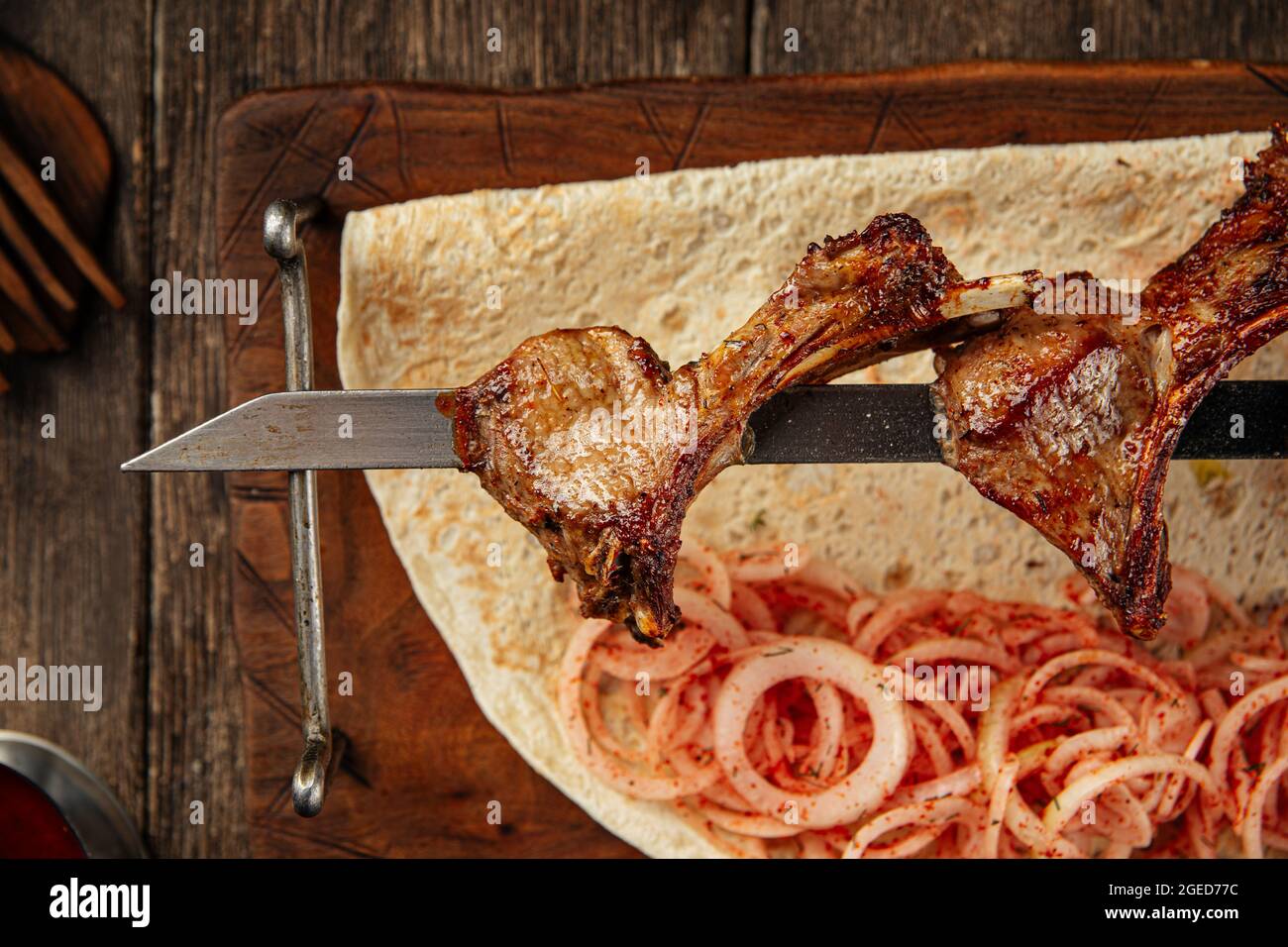 Grilled georgian lamb ribs shashlik skewers Stock Photo - Alamy