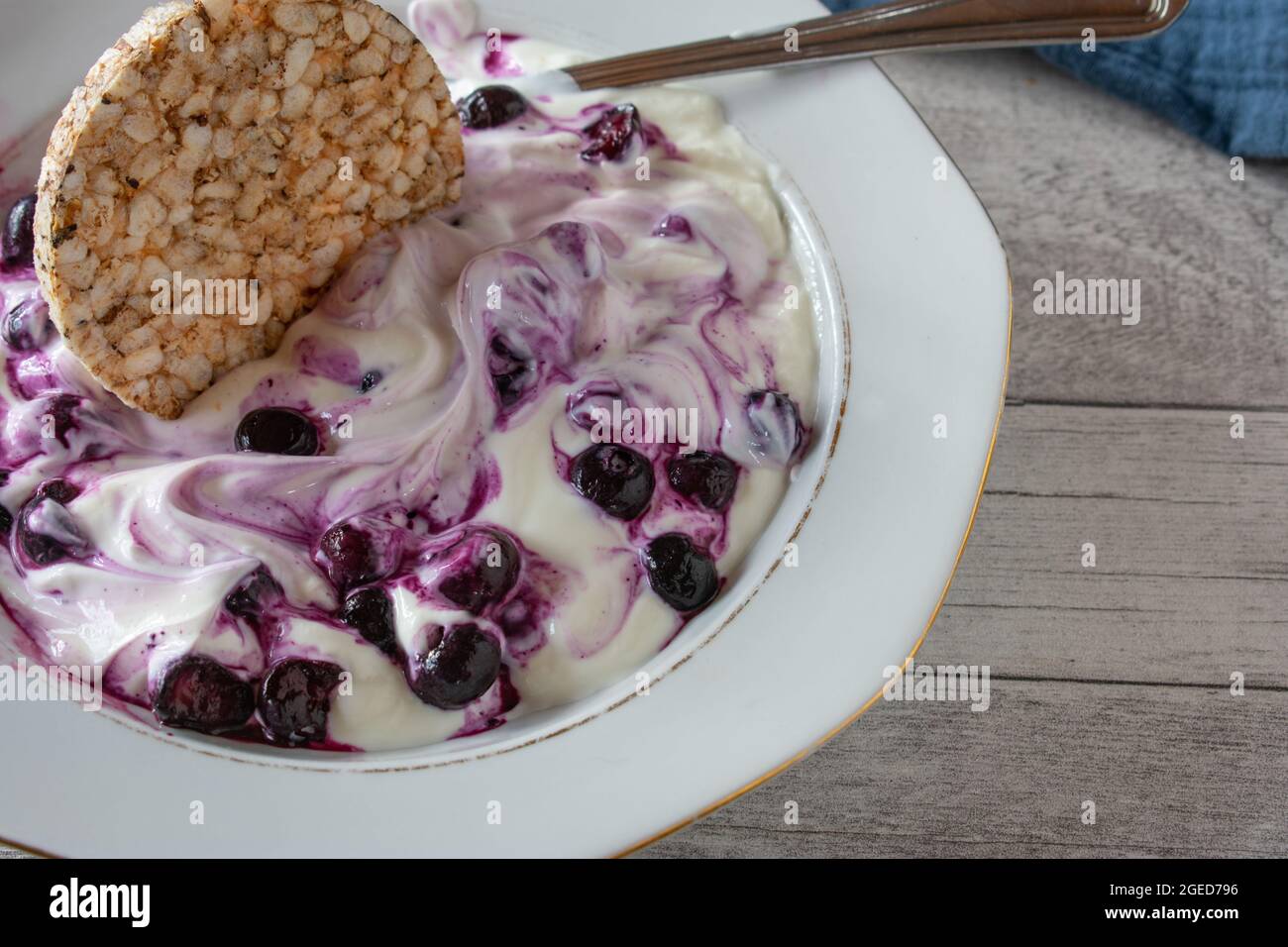Skyr with fruits and rice cracker. Healthy gluten free breakfast with ...