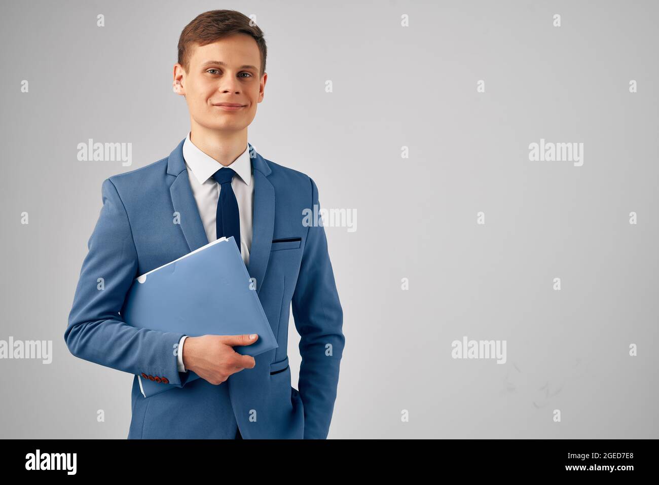 manager in a suit office work self-confidence documents Stock Photo - Alamy