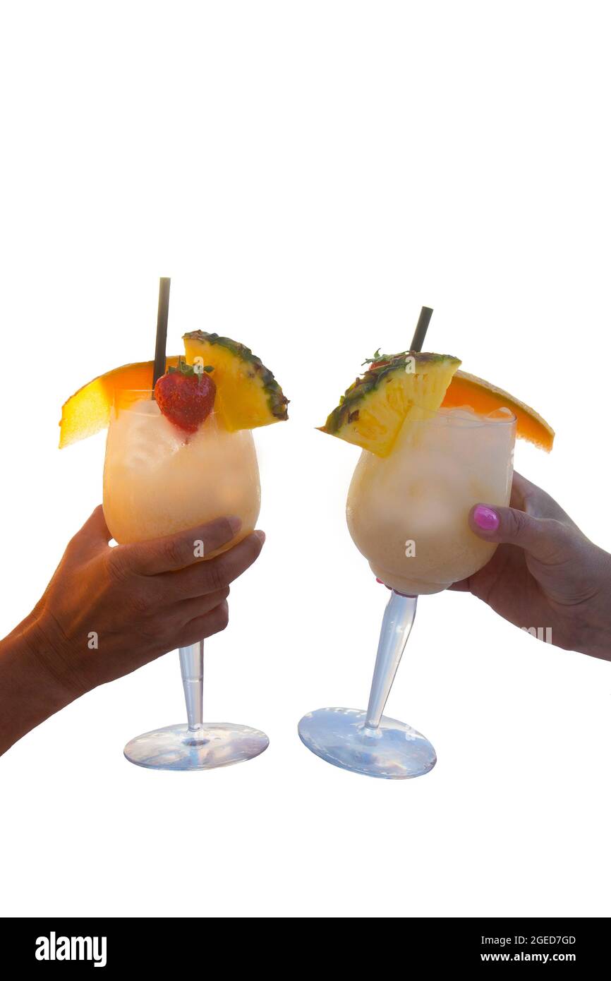 toast with two summer cocktails decorated with fruit isolated Stock ...
