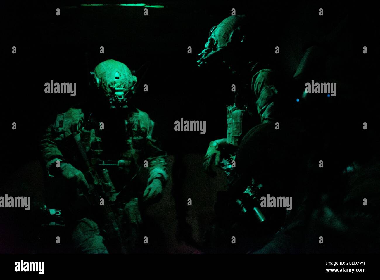 U.S. special operations service members conduct combat operations in ...