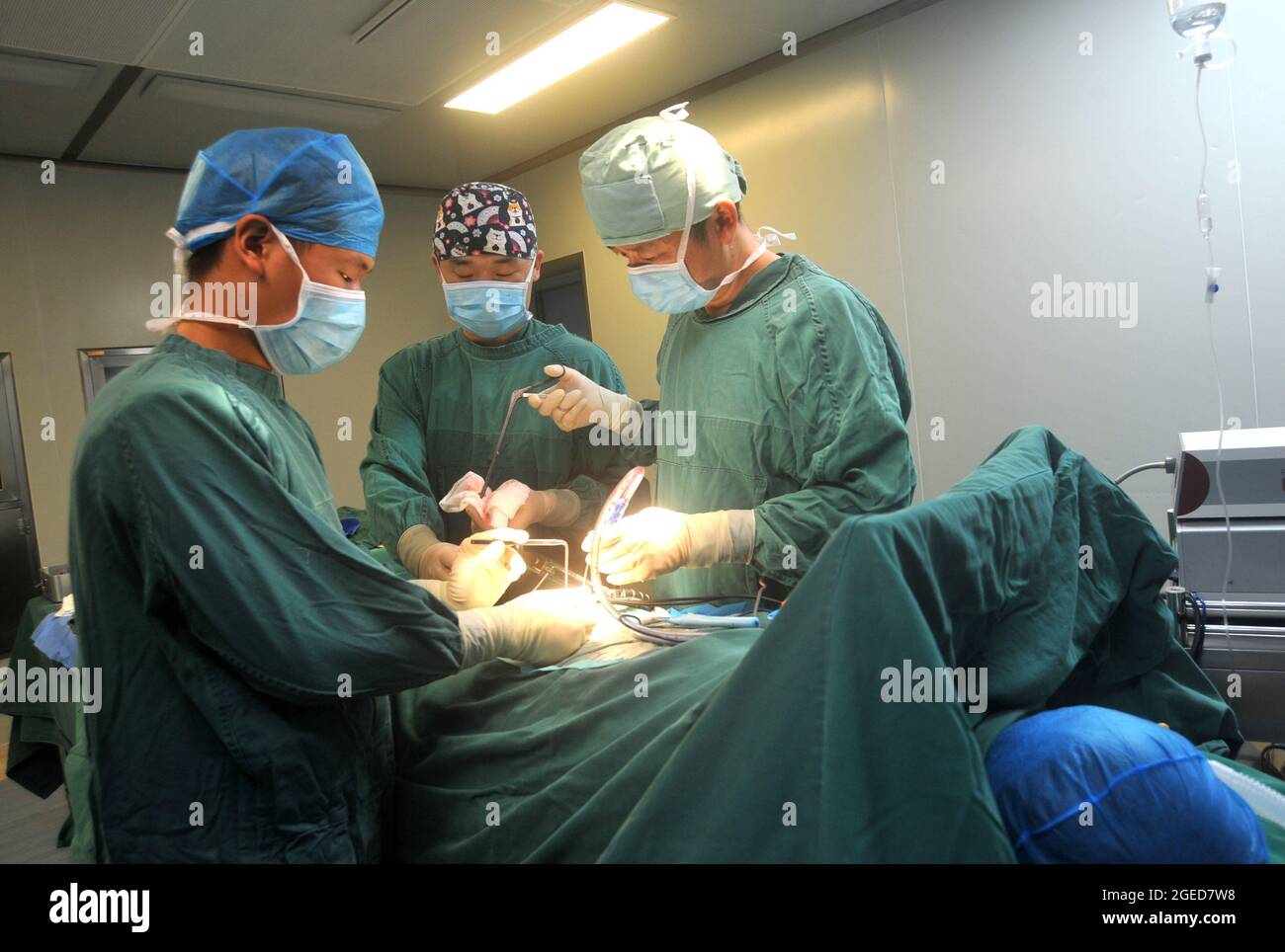 GUIYANG, CHINA - AUGUST 19, 2021 - Medical staff perform surgery on a ...