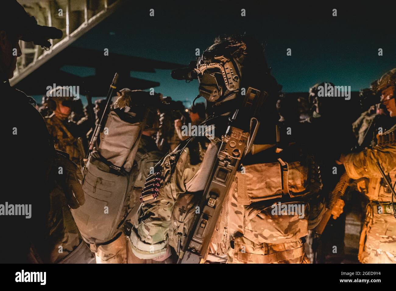 U.S. special operations service members conduct combat operations in ...