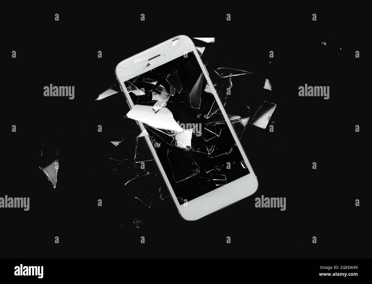 Mobile phone with cracked glass screen on dark background Stock Photo ...
