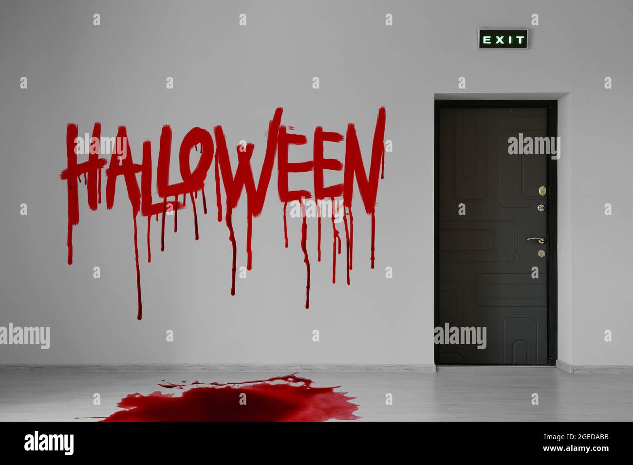 Word Halloween Written In Blood On Light Wall Stock Photo Alamy