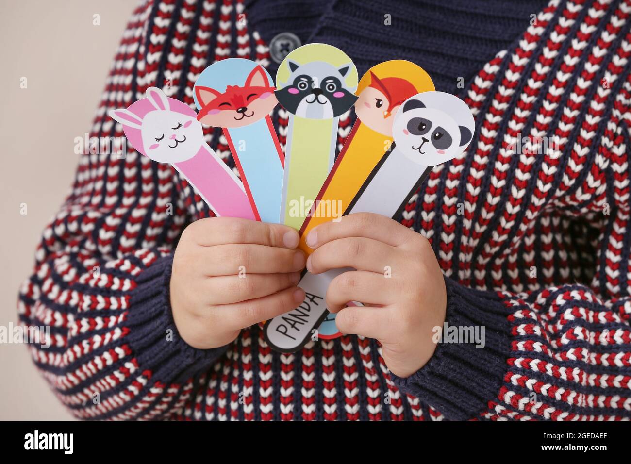 Little child with cute bookmarks, closeup Stock Photo - Alamy
