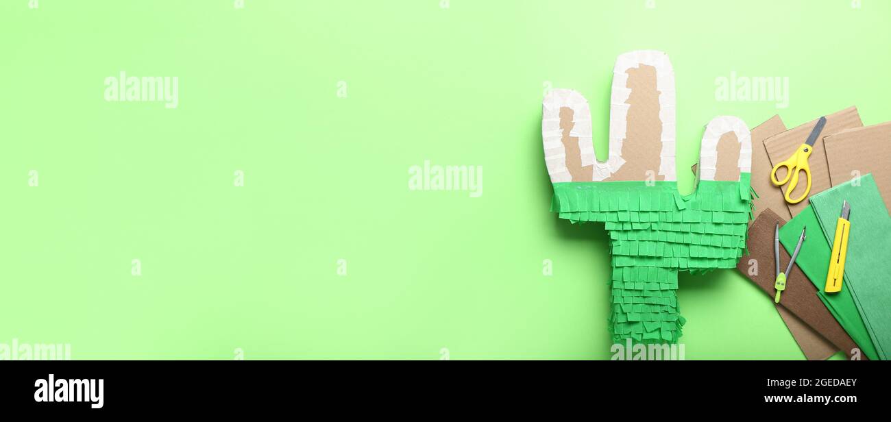 Handmade pinata and tools on color background with space for text Stock ...