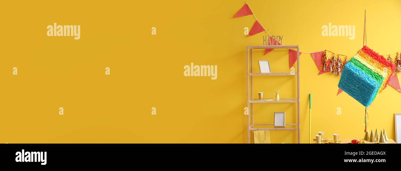 Interior of modern room with pinata and decor Stock Photo - Alamy