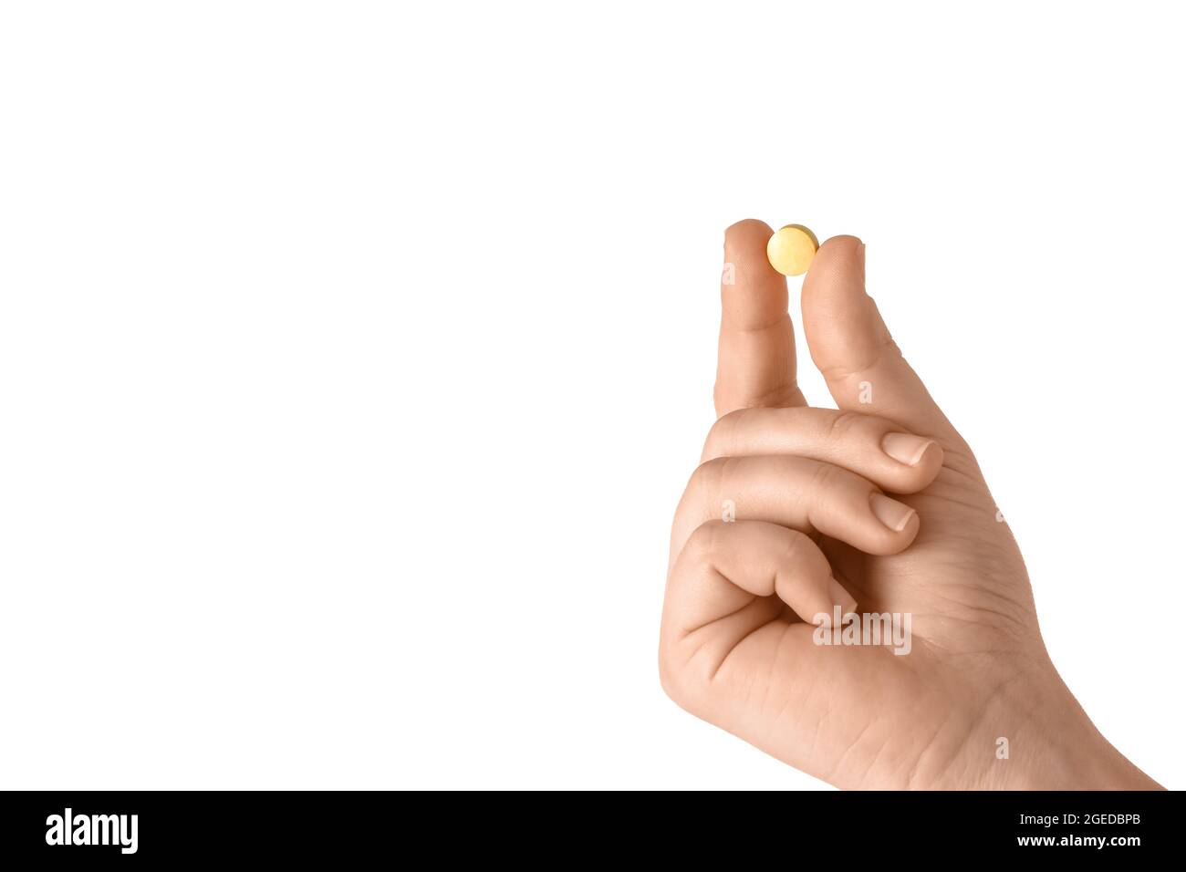 Female hand and pill on white background Stock Photo - Alamy