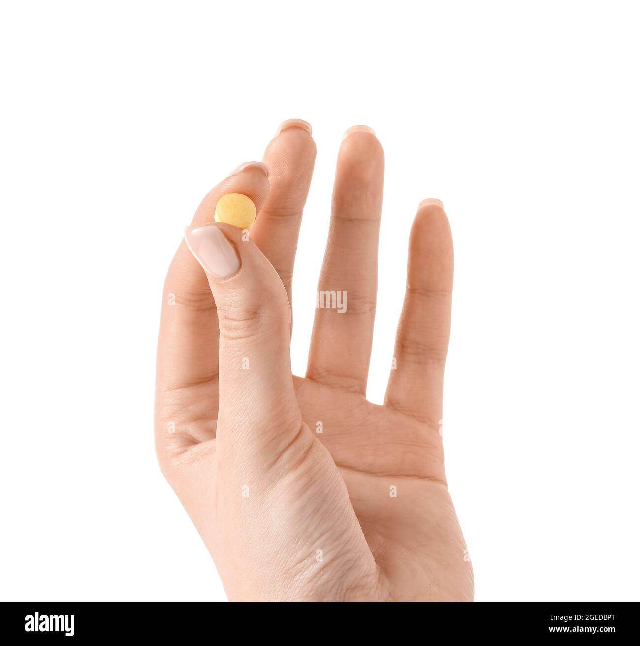 Female hand and pill on white background Stock Photo - Alamy