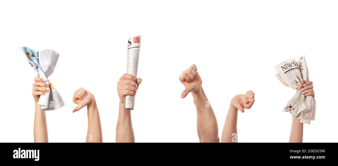 People with newspapers showing thumb-down on white background Stock ...