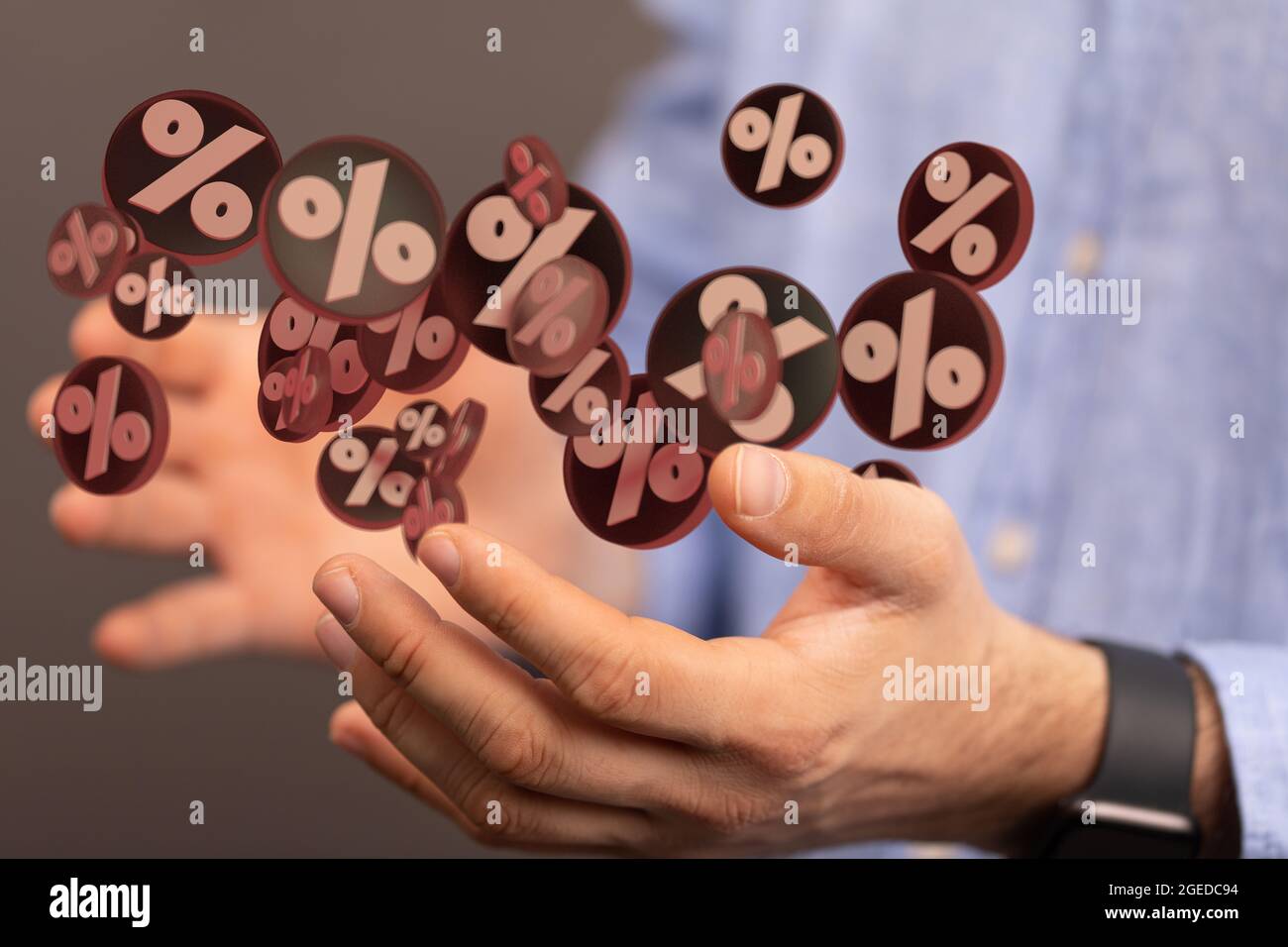 Percent signs in hands Stock Photo - Alamy