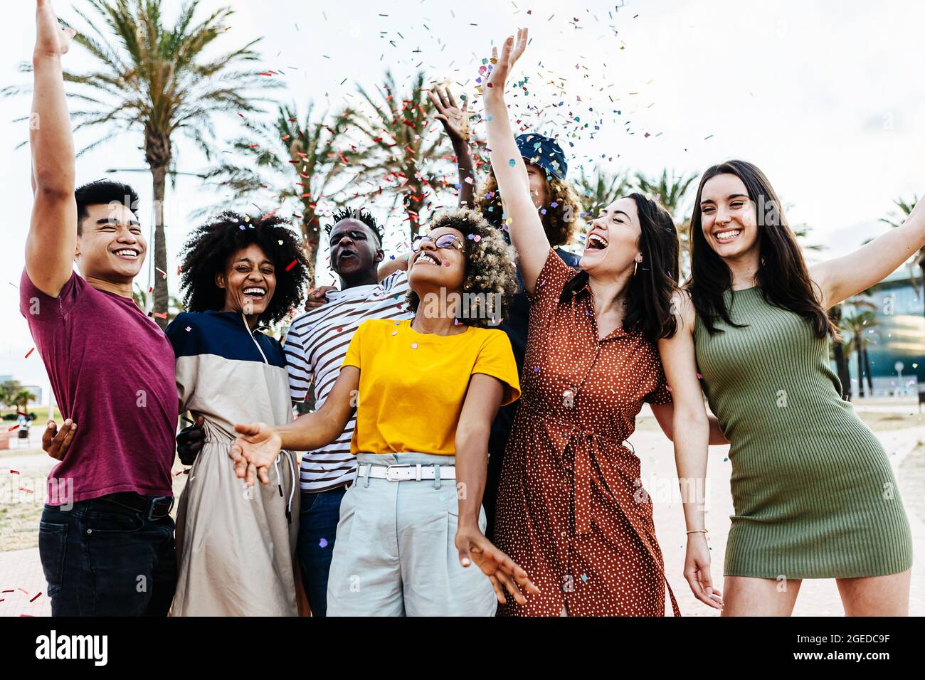 Young multiracial hipster people having fun in summer party celebration ...
