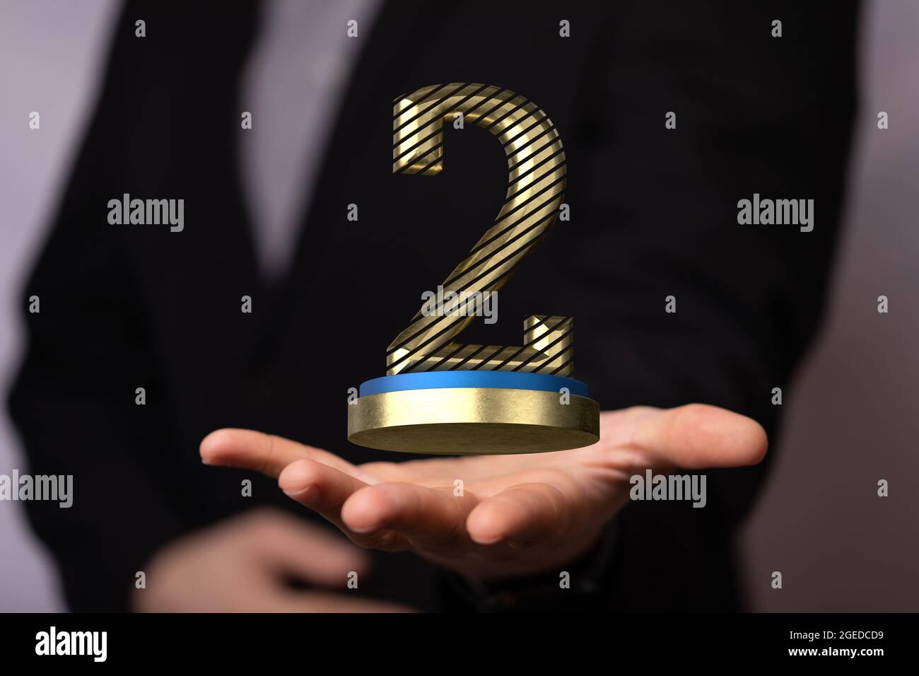 2nd place award in a male hand Stock Photo - Alamy