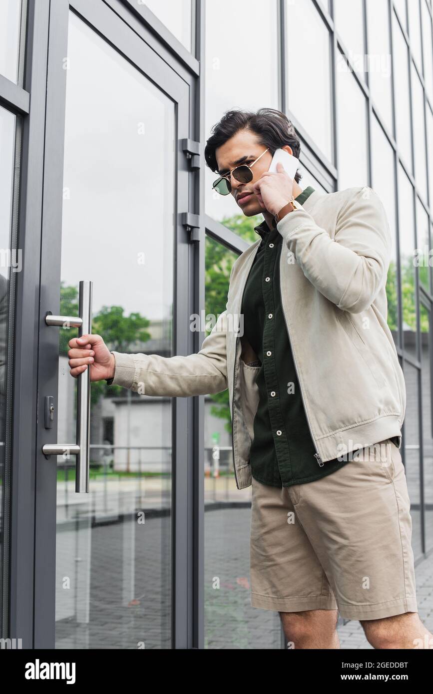 Man entering building blur hi-res stock photography and images - Alamy