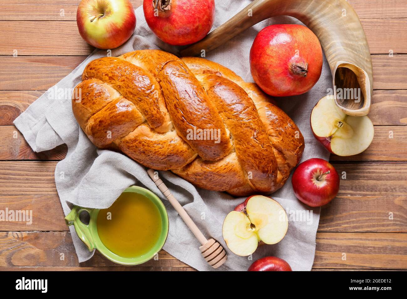 Honey with fruits, shofar and challah on wooden background. Rosh ...