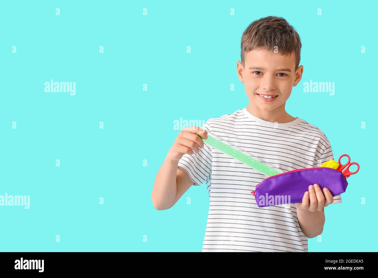 Boy holding pencil hi-res stock photography and images - Alamy