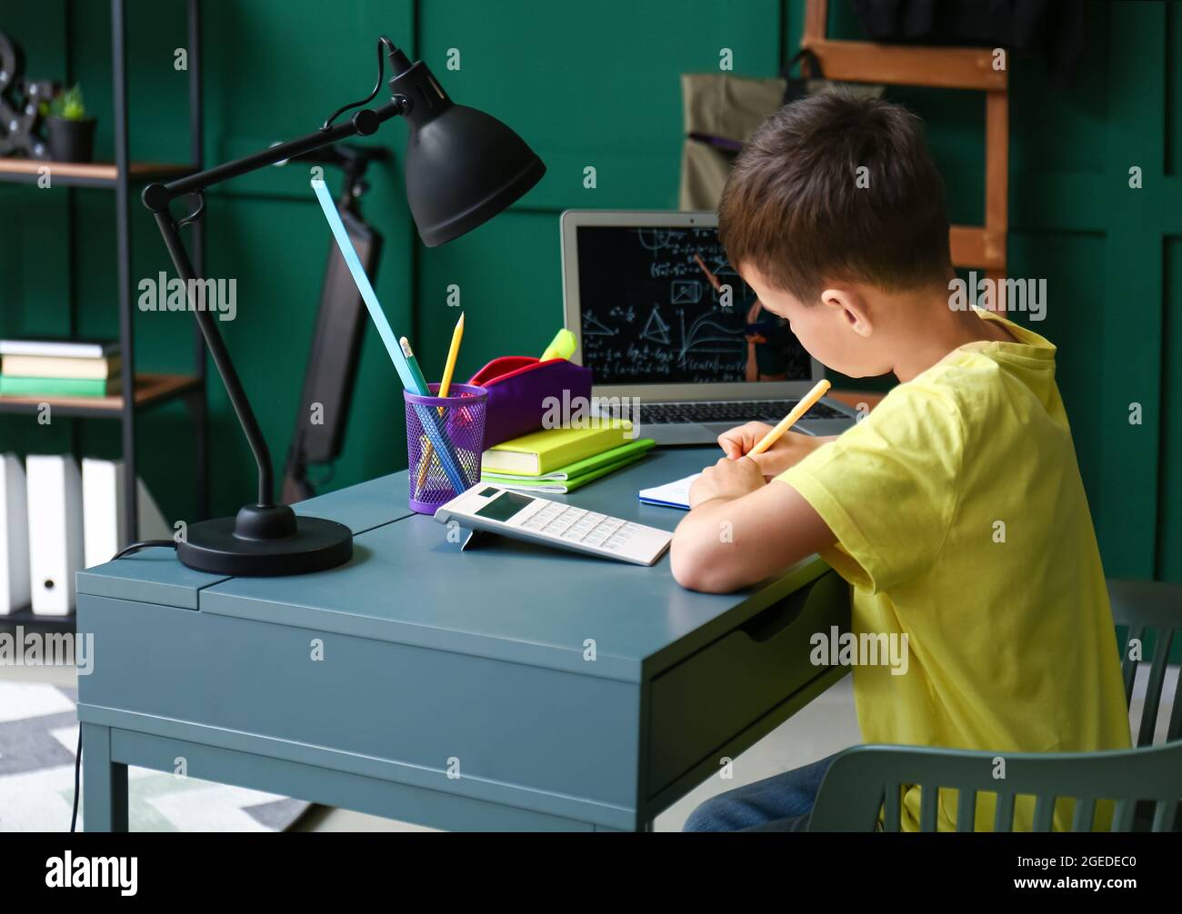 Little boy studying Math online at home Stock Photo - Alamy