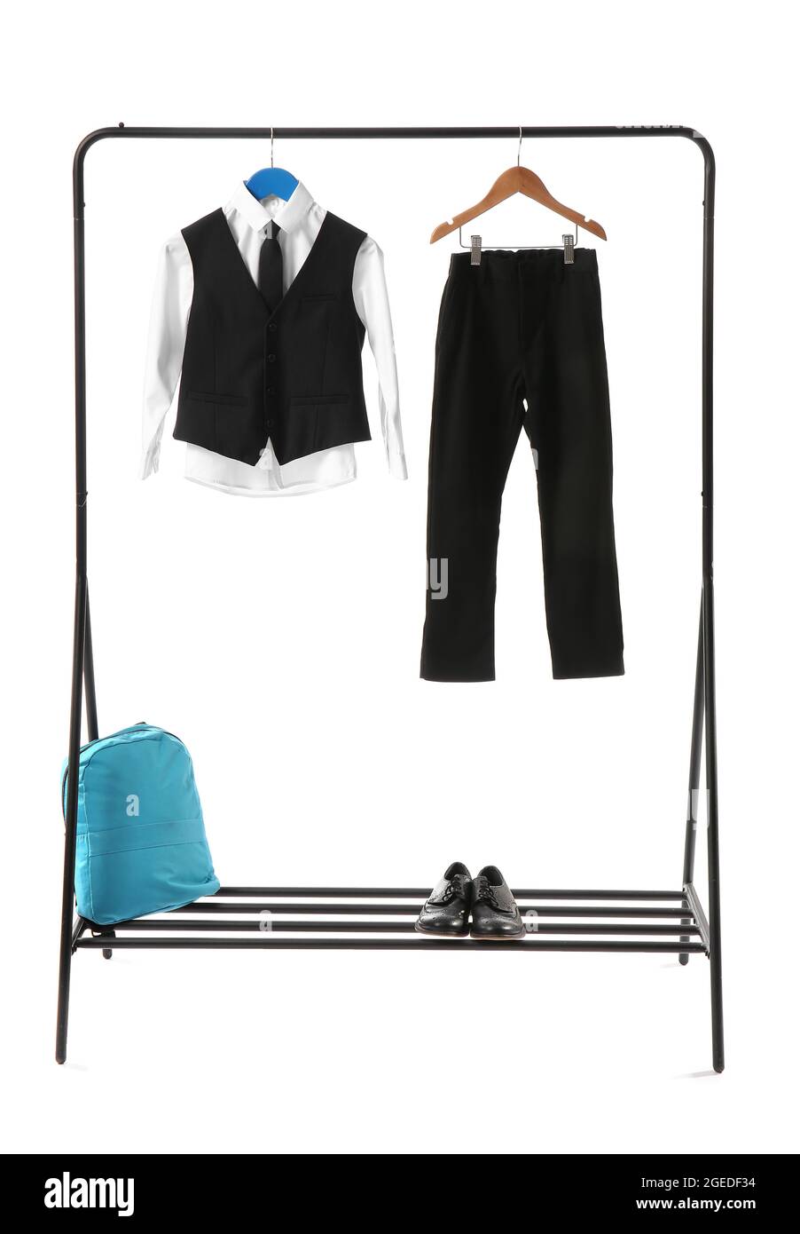 Rack with stylish school uniform on white background Stock Photo - Alamy