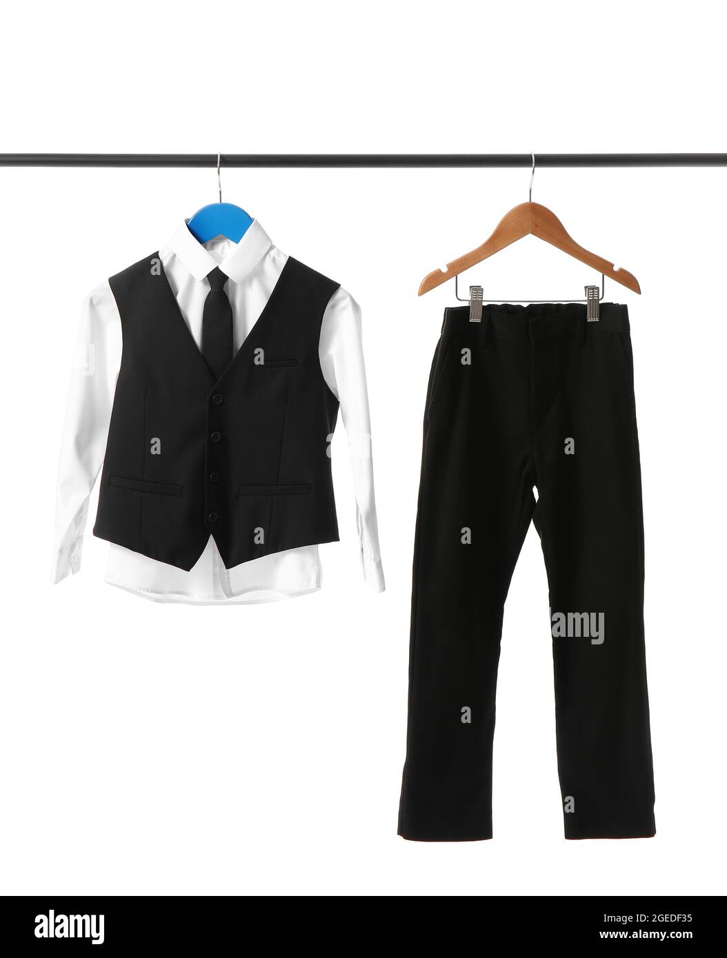 Rack with stylish school uniform on white background Stock Photo - Alamy