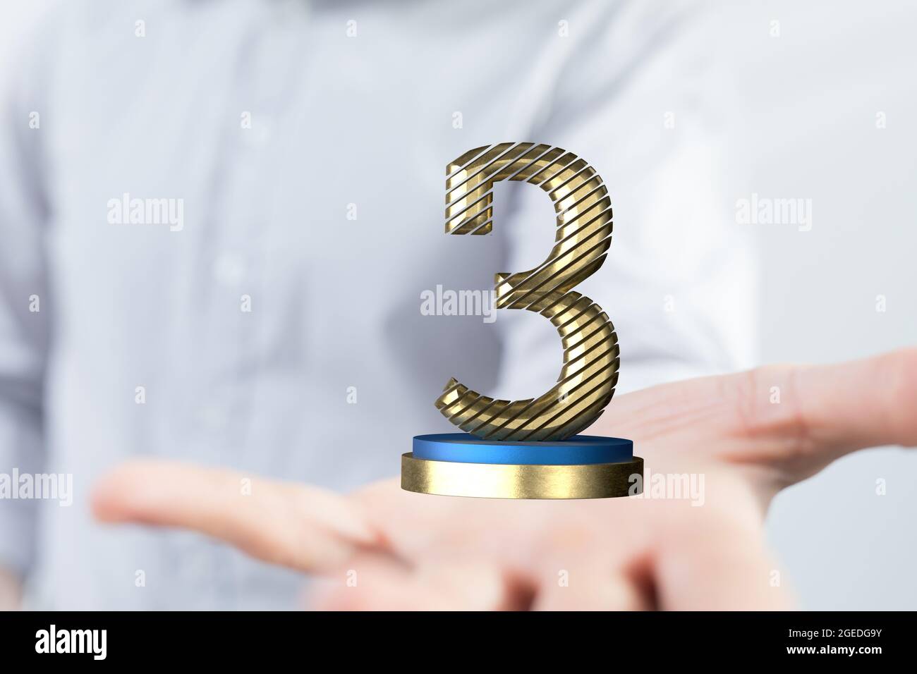 3rd place letter in 3d in hand Stock Photo - Alamy