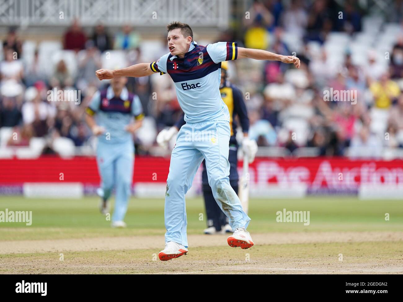 Durham's Matty Potts celebrates taking the wicket of Glamorgan's Billy ...