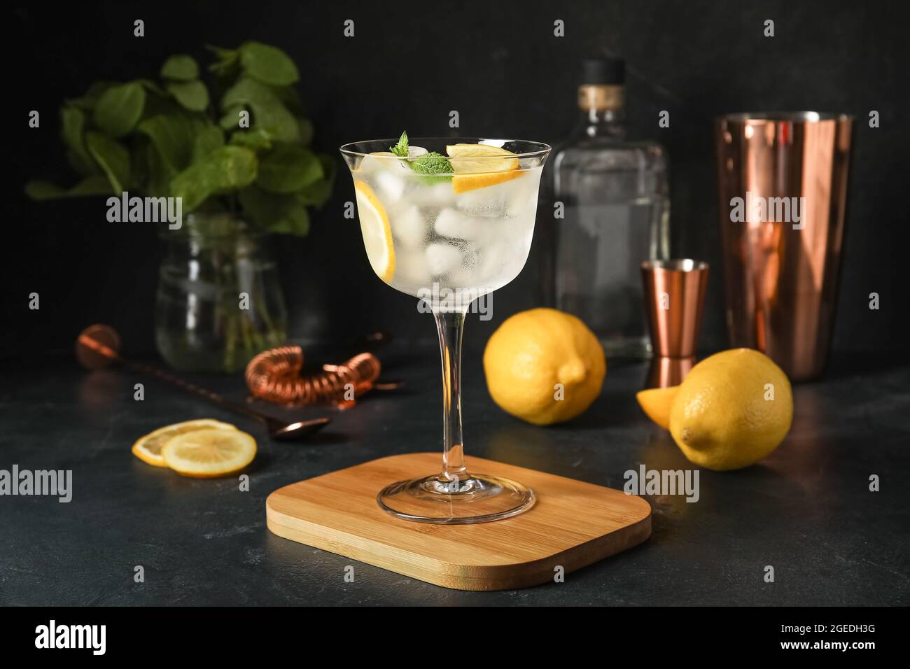 Glass of cold gin and tonic on dark background Stock Photo - Alamy