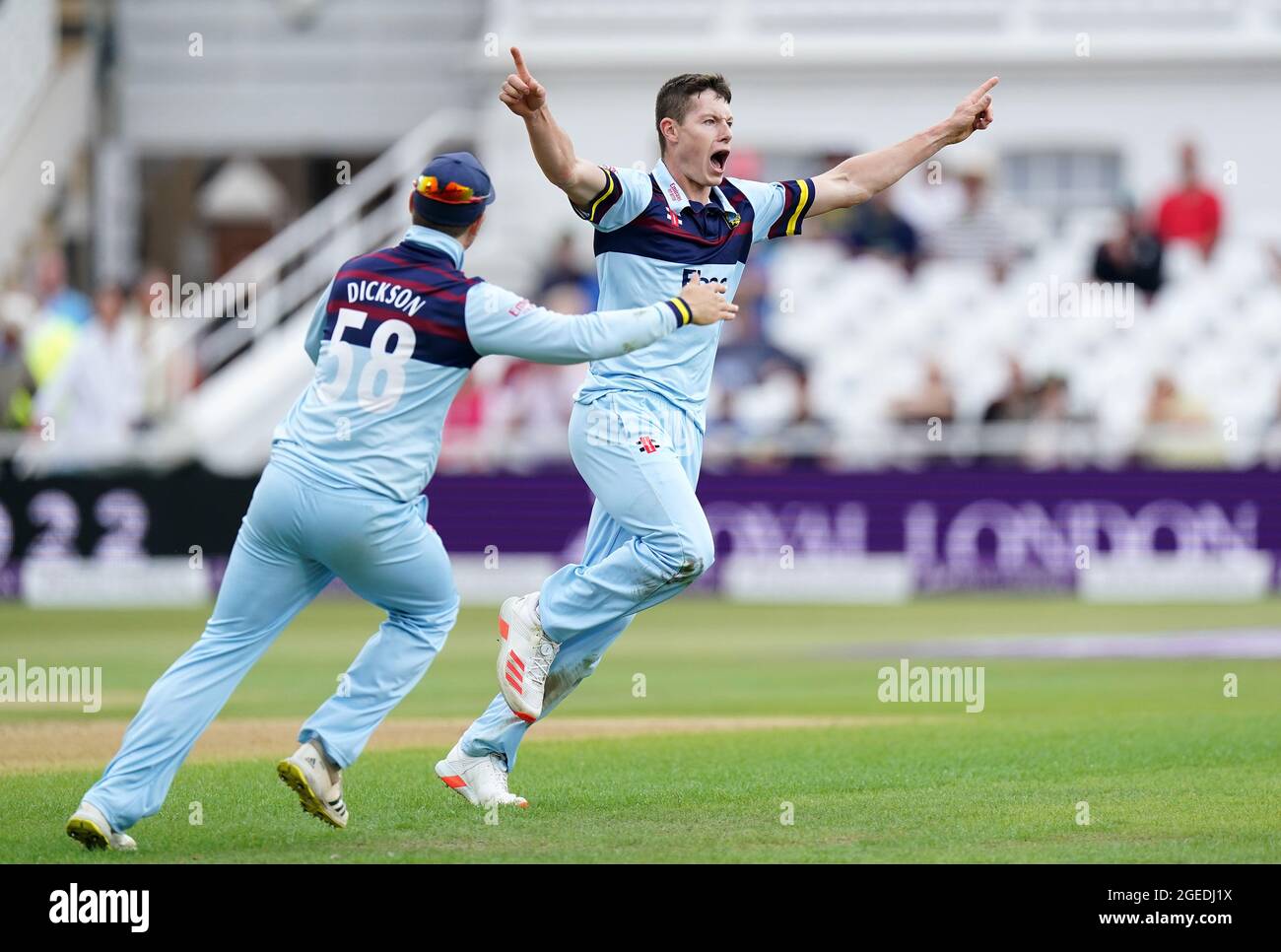 Durham's Matty Potts (right) celebrates taking the wicket of Glamorgan ...